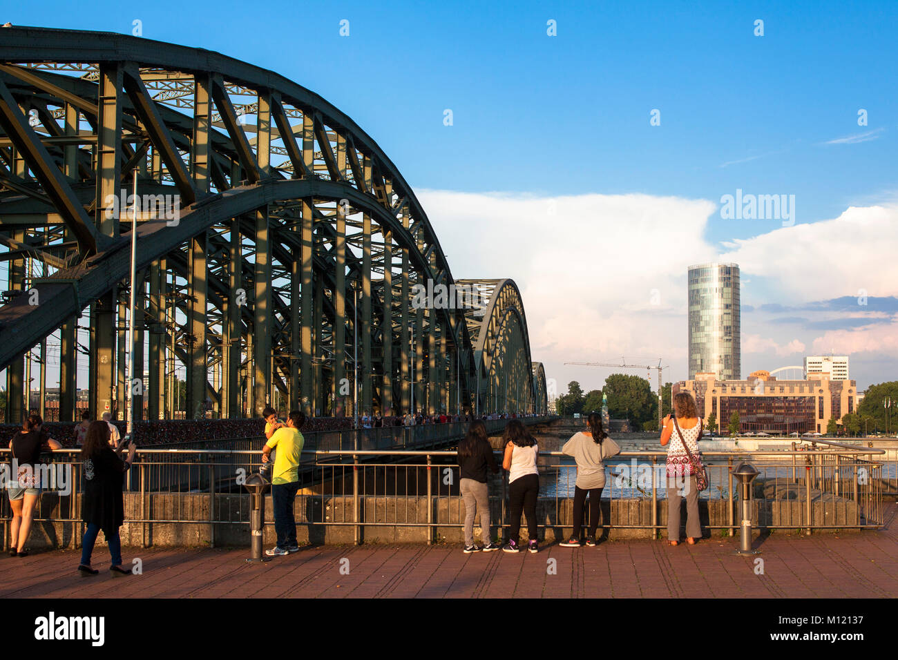 Germany, Cologne, view across the river Rhine, Hohenzollern bridge and ...