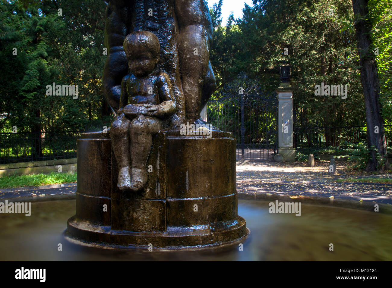 Germany, Cologne, fountain with putti in front of the main entrance of ...