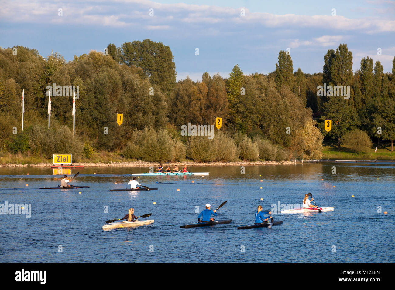 Germany, Cologne, boat race course at lake Fuehlingen, canoeists ...