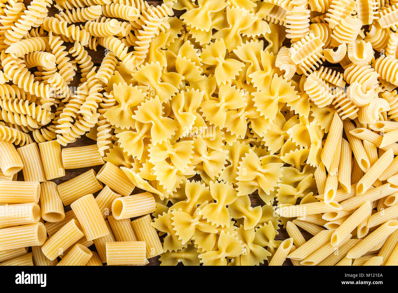 Different Types of Raw Pastas such as Fusilli, Penne Rigate, Radiatori ...