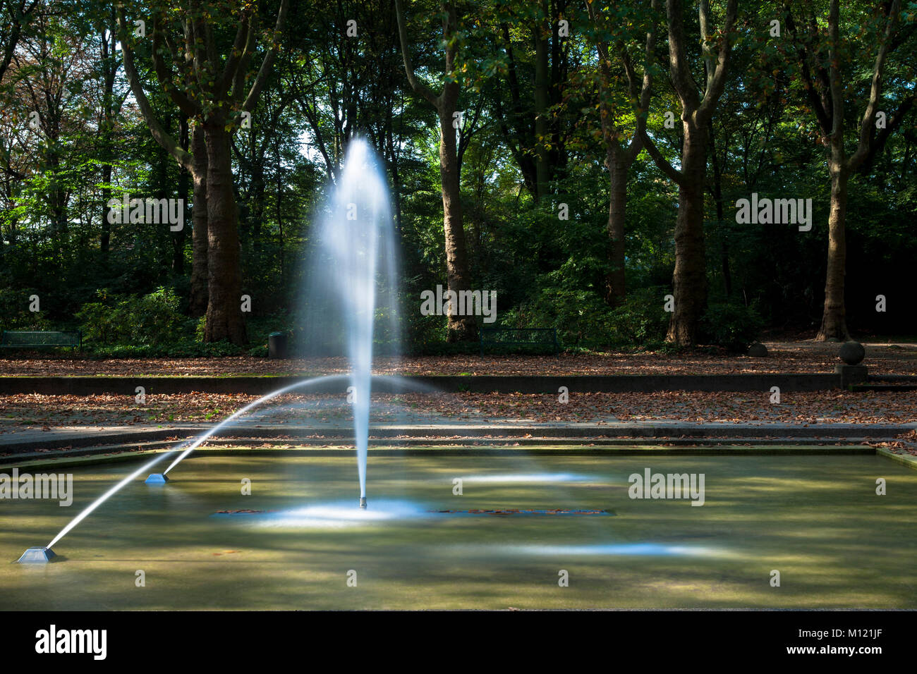 Germany, Cologne, fountain at the Bluecher park in the town districts ...