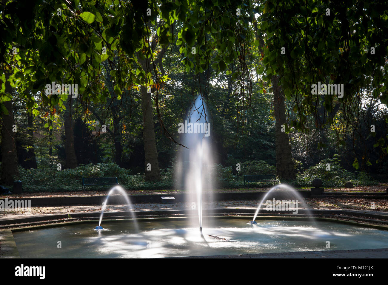 Germany, Cologne, fountain at the Bluecher park in the town districts ...