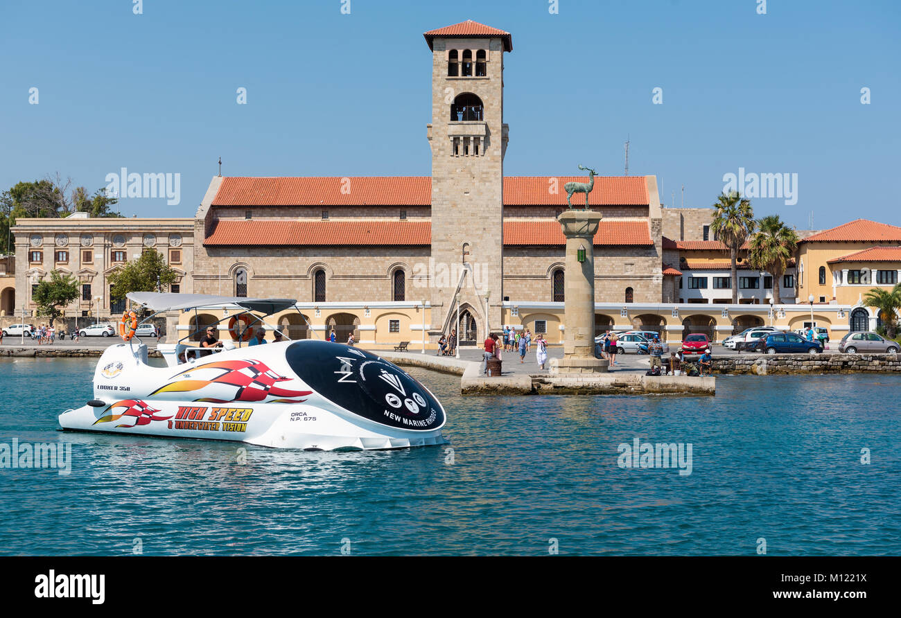 RHODES, GREECE - AUGUST 2017: Excursion boat is driving along old ...