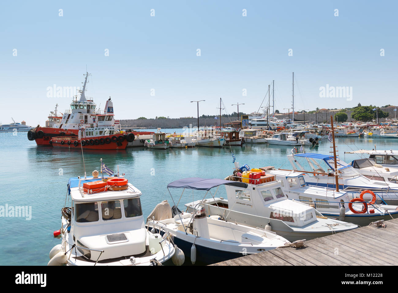 RHODES, GREECE- AUGUST 2017: Yachts at seaport of Rhodes town on Rhodes ...