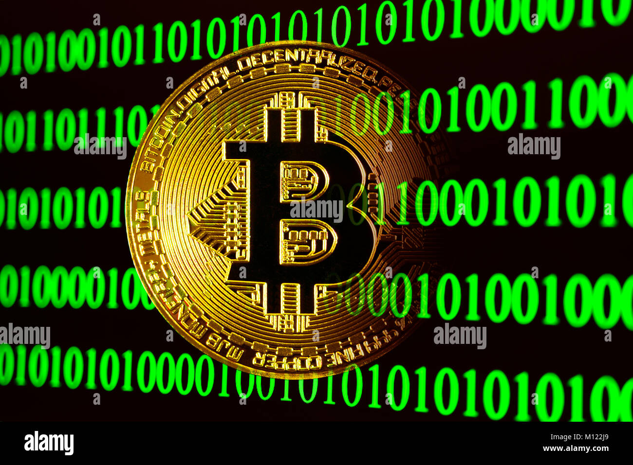 Bitcoin with binary code Stock Photo - Alamy