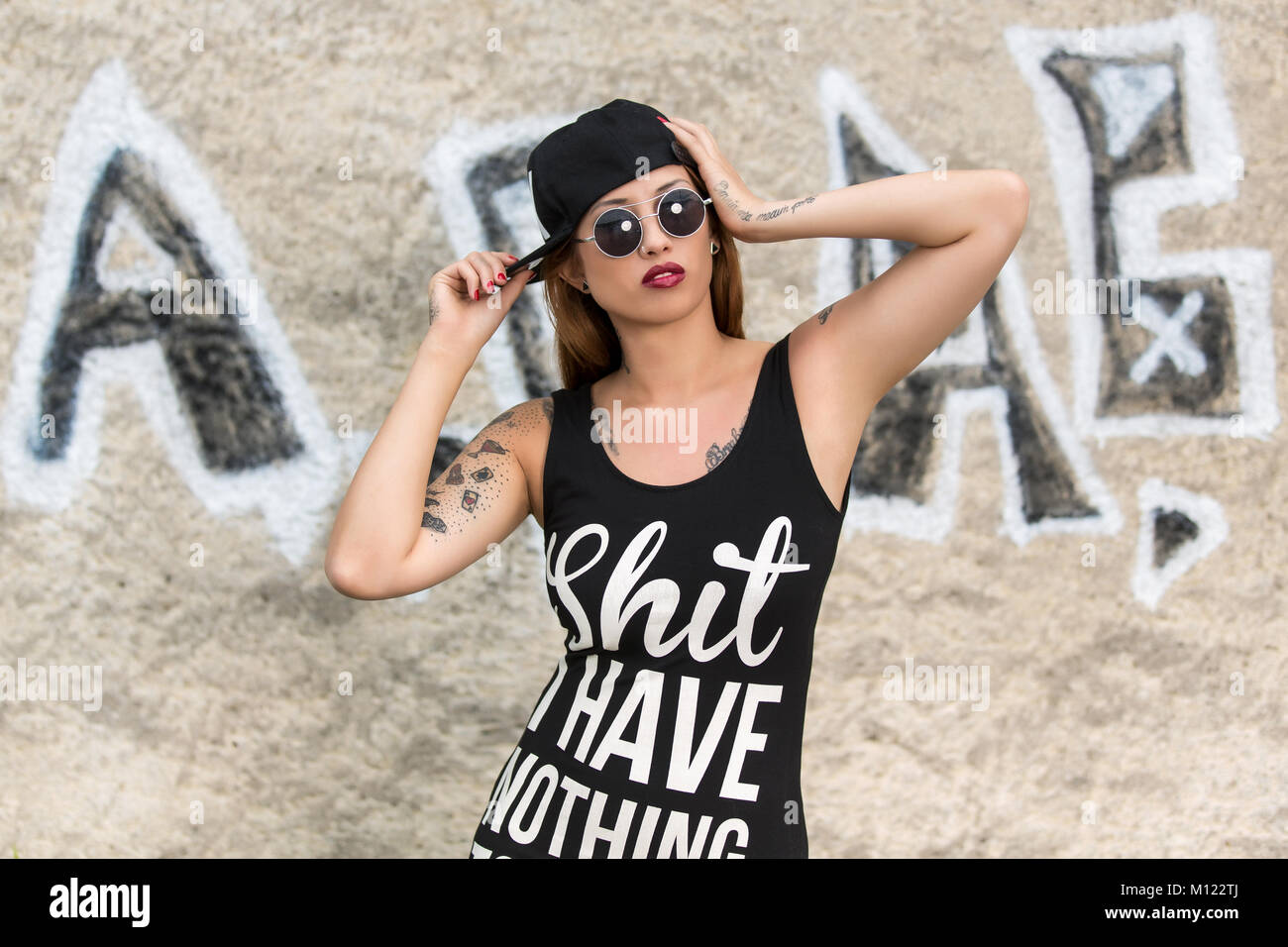 Graffiti wall fashion female hi-res stock photography and images - Alamy