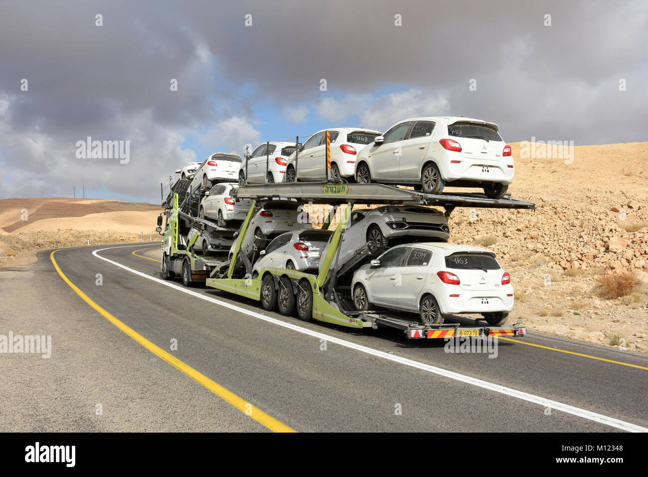 Brand-new cars on a car transport truck, Israel Stock Photo - Alamy
