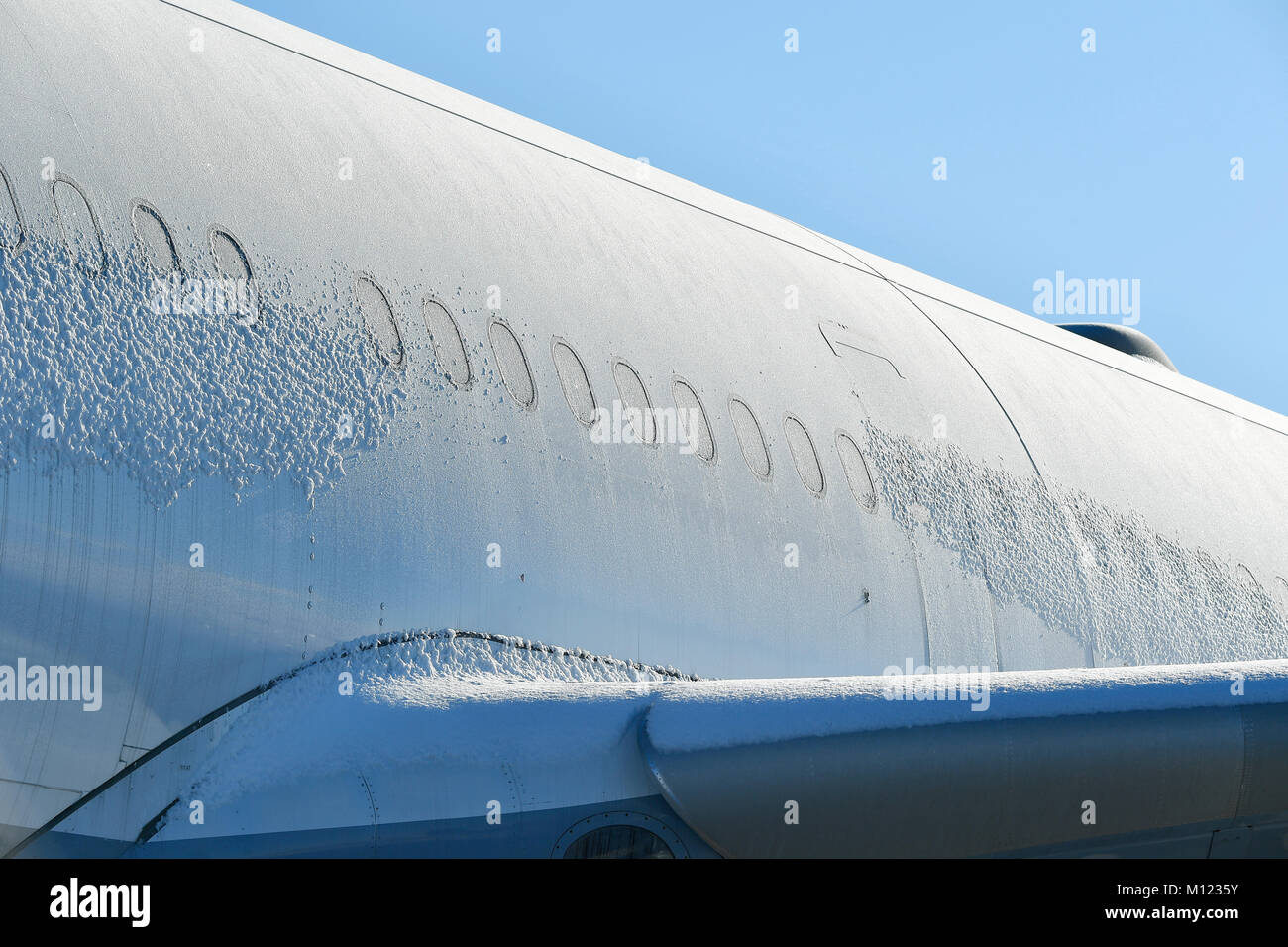 Ice-covered aircraft,windows,cabin,fuselage,wing iced,Lufthansa Airbus ...