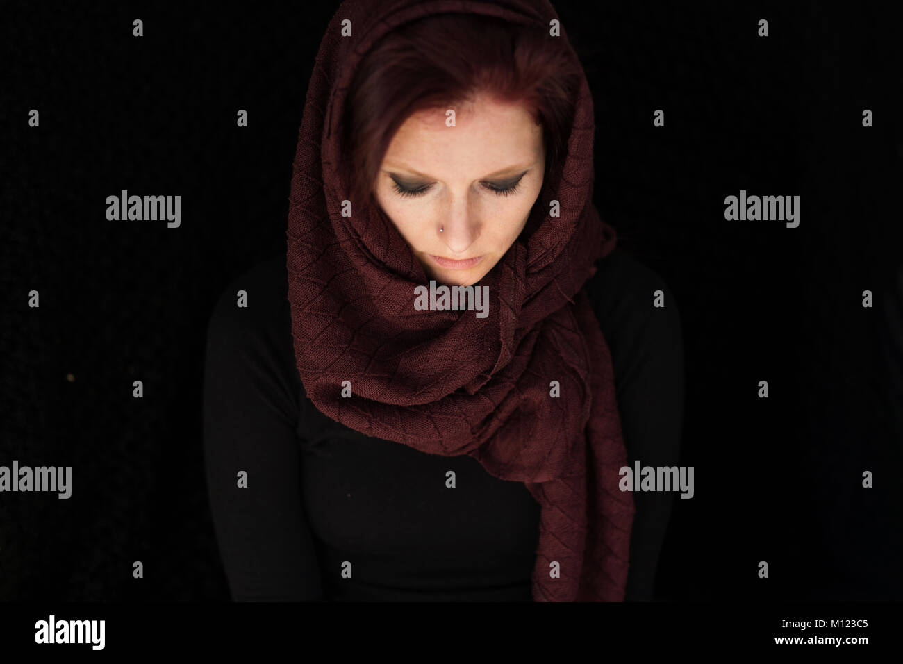 Woman with cloth on her head Stock Photo - Alamy