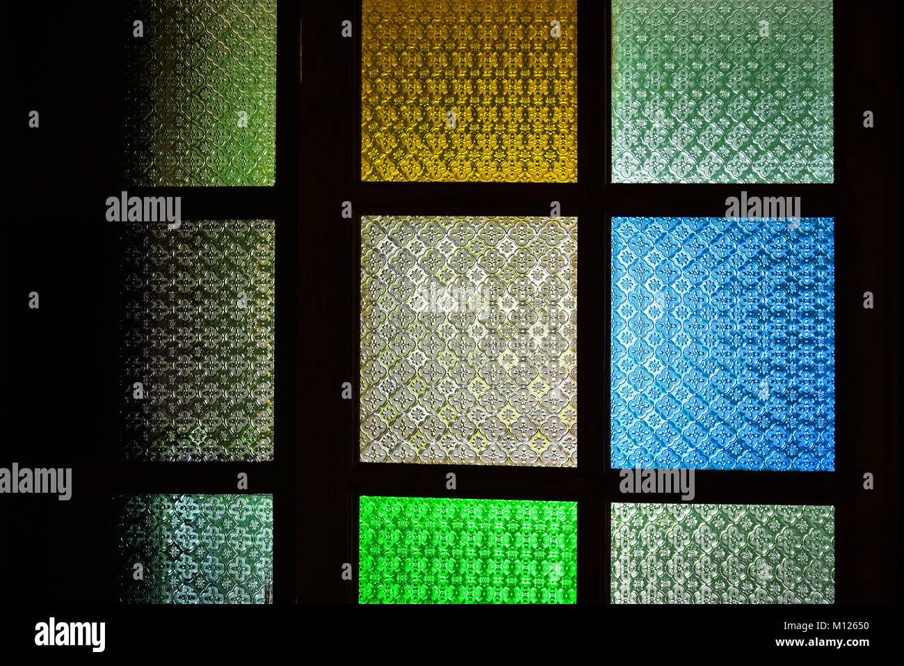 Colorful mosaic stained glass window. Multicolor glass window Stock ...