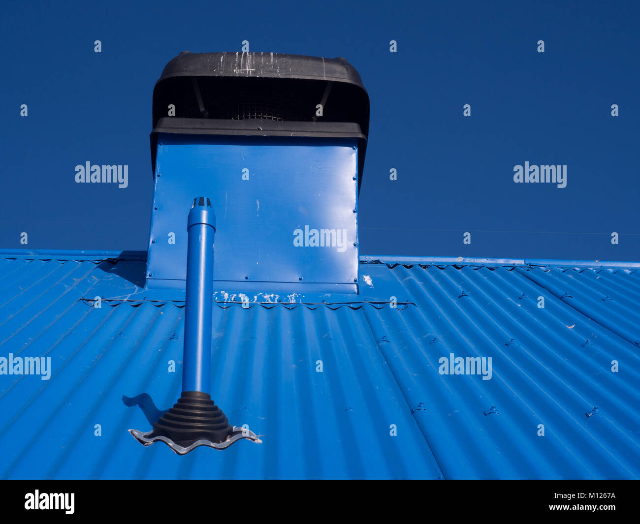 Blue Chimney And Roof Stock Photo - Alamy