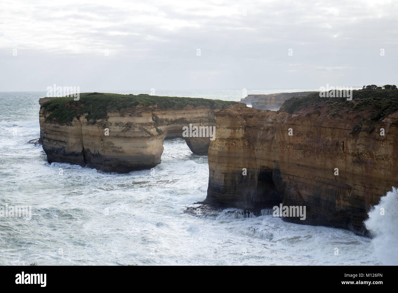 Scenic limestone cliffs and eroded coastal formations along the Great ...