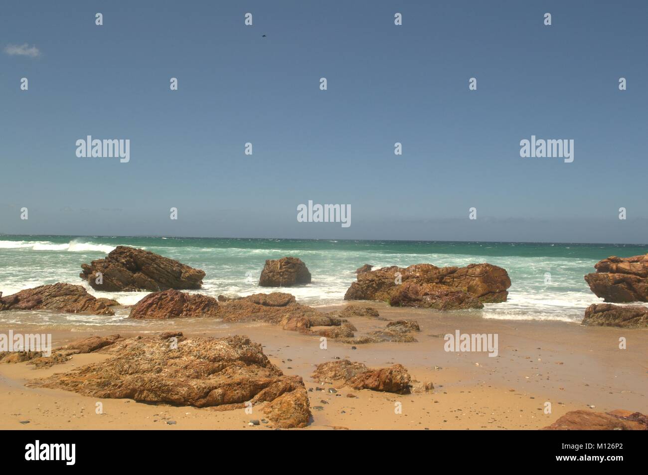 Rocks at the Beach Stock Photo - Alamy