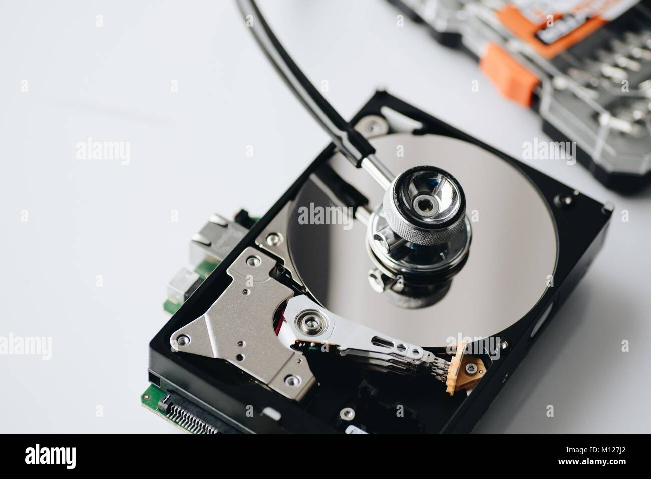Hard disk drive health. Medical stethoscope on opened hard disk Stock ...