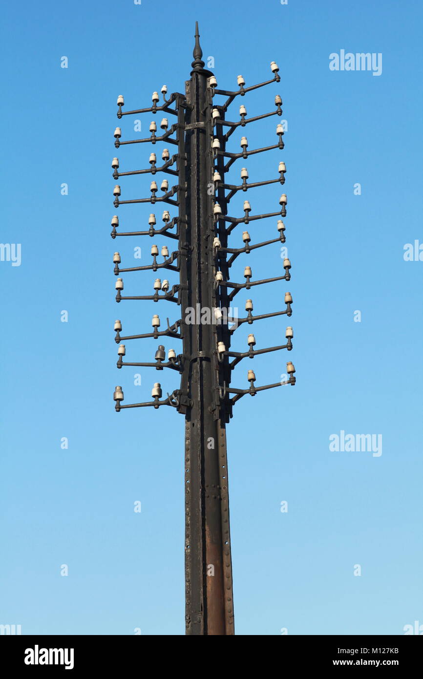 old metal telegraph pole on the sky background Stock Photo - Alamy