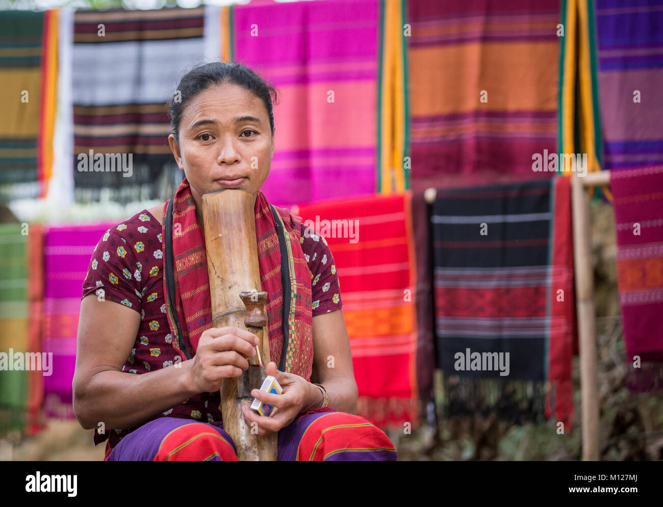 Asian woman smoking pipe hi-res stock photography and images - Alamy