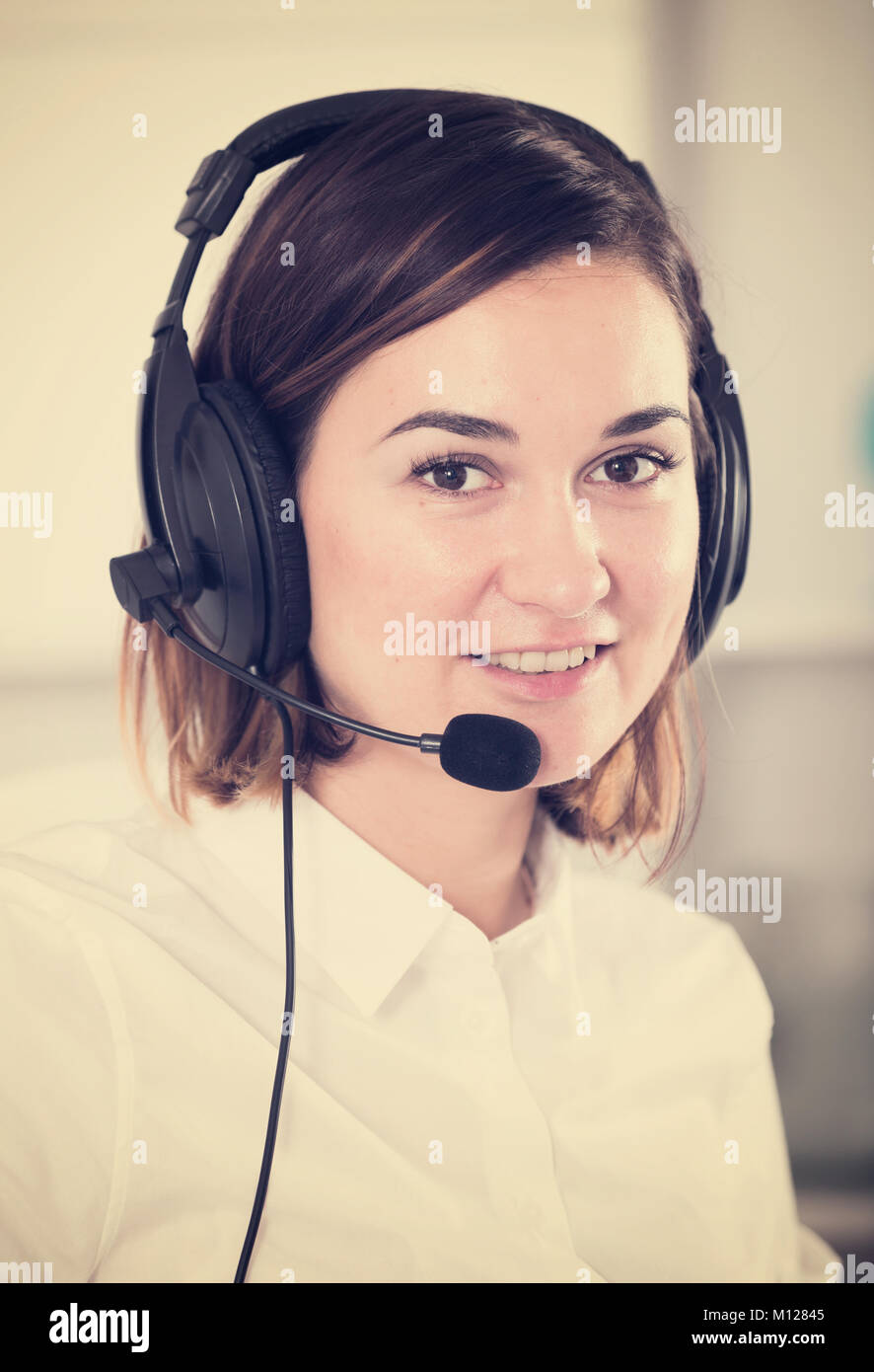 Female employee having a productive day at call-centre Stock Photo - Alamy
