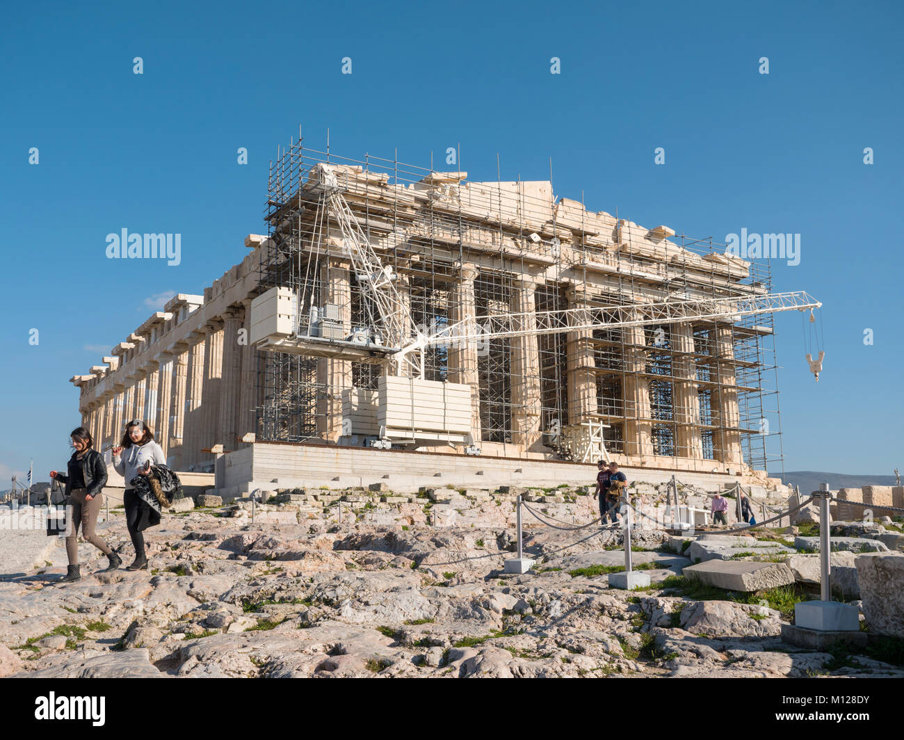 ATHENS,GREECE-FEBRUARY 1, 2016: tourists visit the temple of Parthenon ...