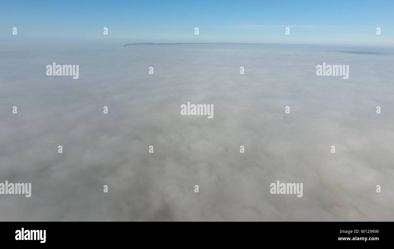 Fog above the ground. Top view of the fog. Low clouds. Morning mist ...