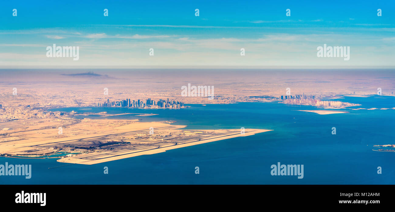 Aerial view of Doha and Hamad International Airport. Qatar, the Middle ...