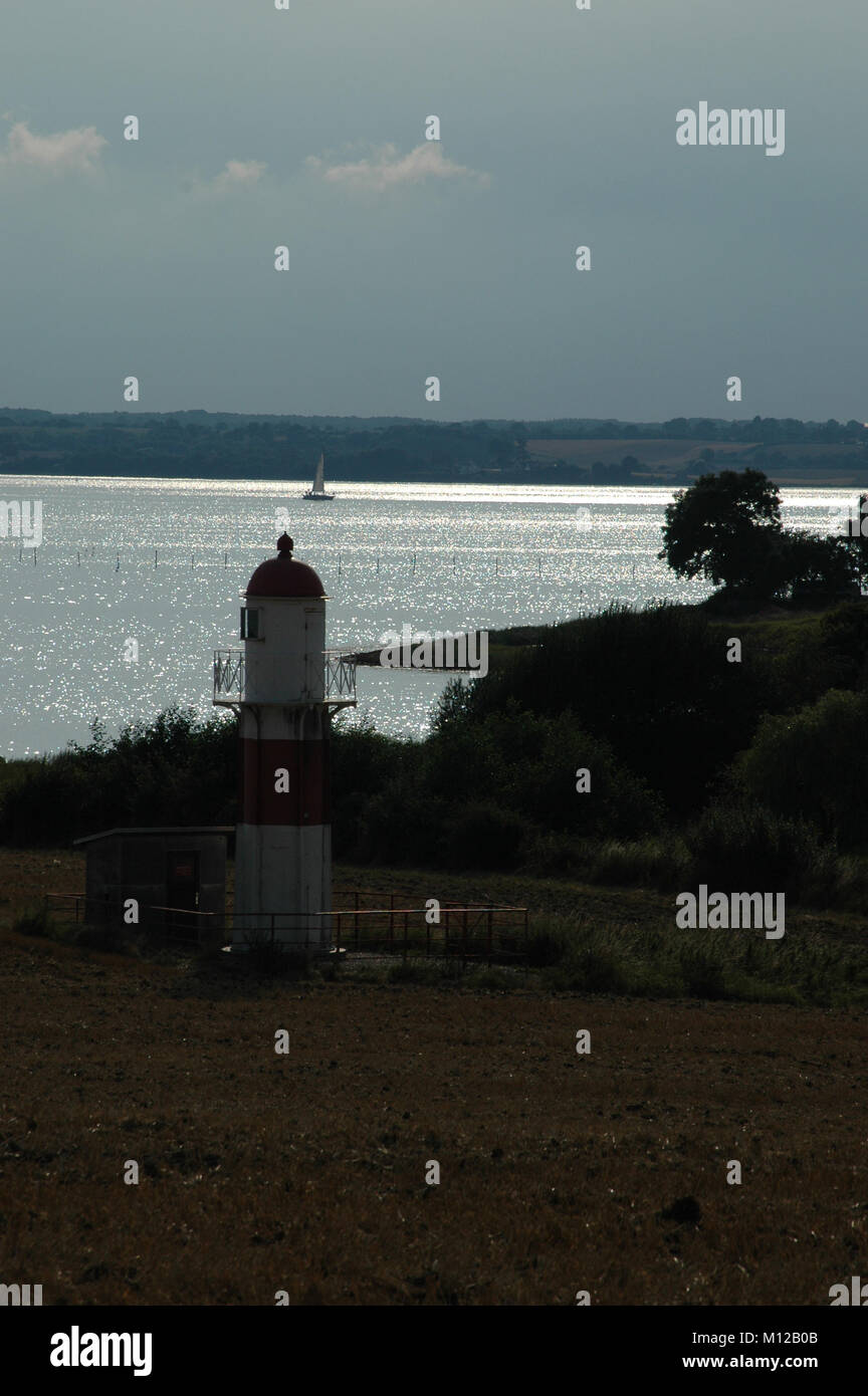 Coast landscape with a lighthouse Stock Photo - Alamy