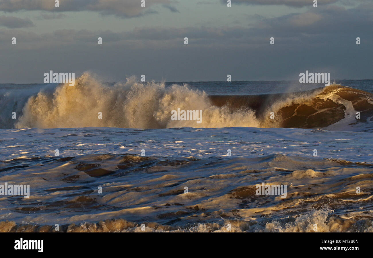 waves breaking on sandy shore Eccles-on-Sea, Norfolk, UK December Stock ...