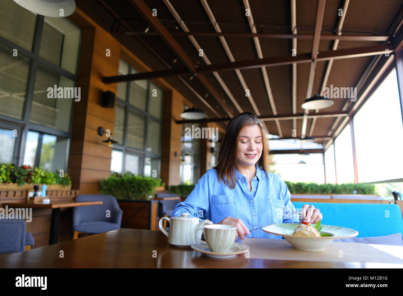 Slow motion woman drinking tea hi-res stock photography and images - Alamy