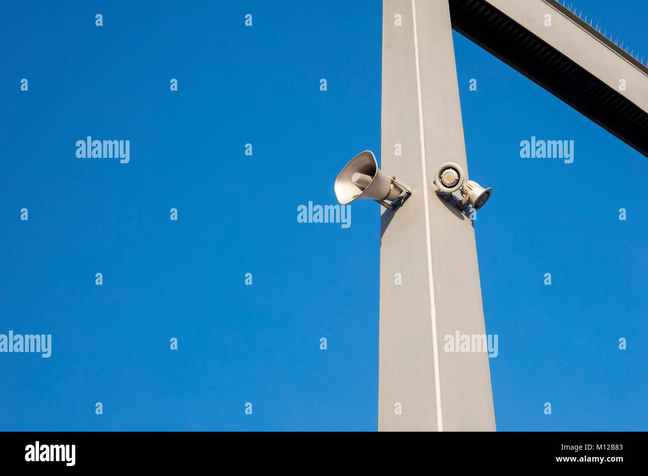 Megaphone placed on iron beams outdoors in blue sky background Stock ...