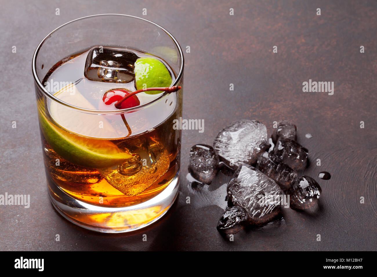 Cuba libre cocktail glass. With copy space Stock Photo - Alamy