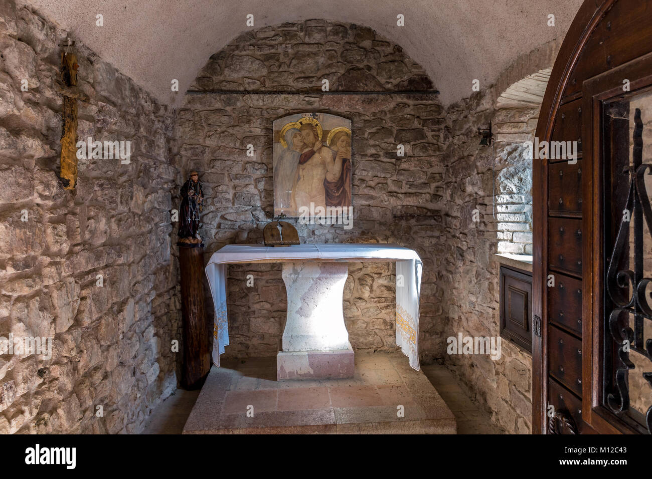 detail of a small medieval altar dedicated to St. Francis of Assisi ...