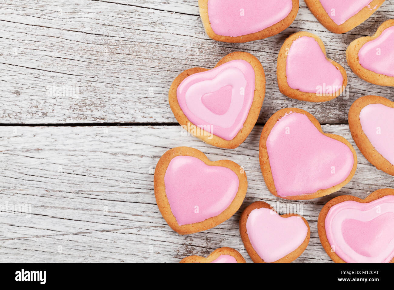 Valentines day greeting card with heart shaped gingerbread cookies over ...