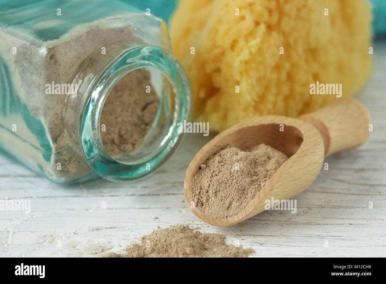 Moroccan rhassoul clay in a spoon on wooden background Stock Photo - Alamy