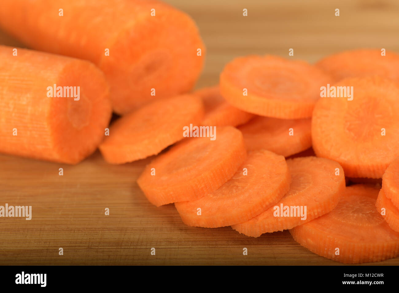 Close up, detail, round sliced raw carrots, ingredient prepared for ...