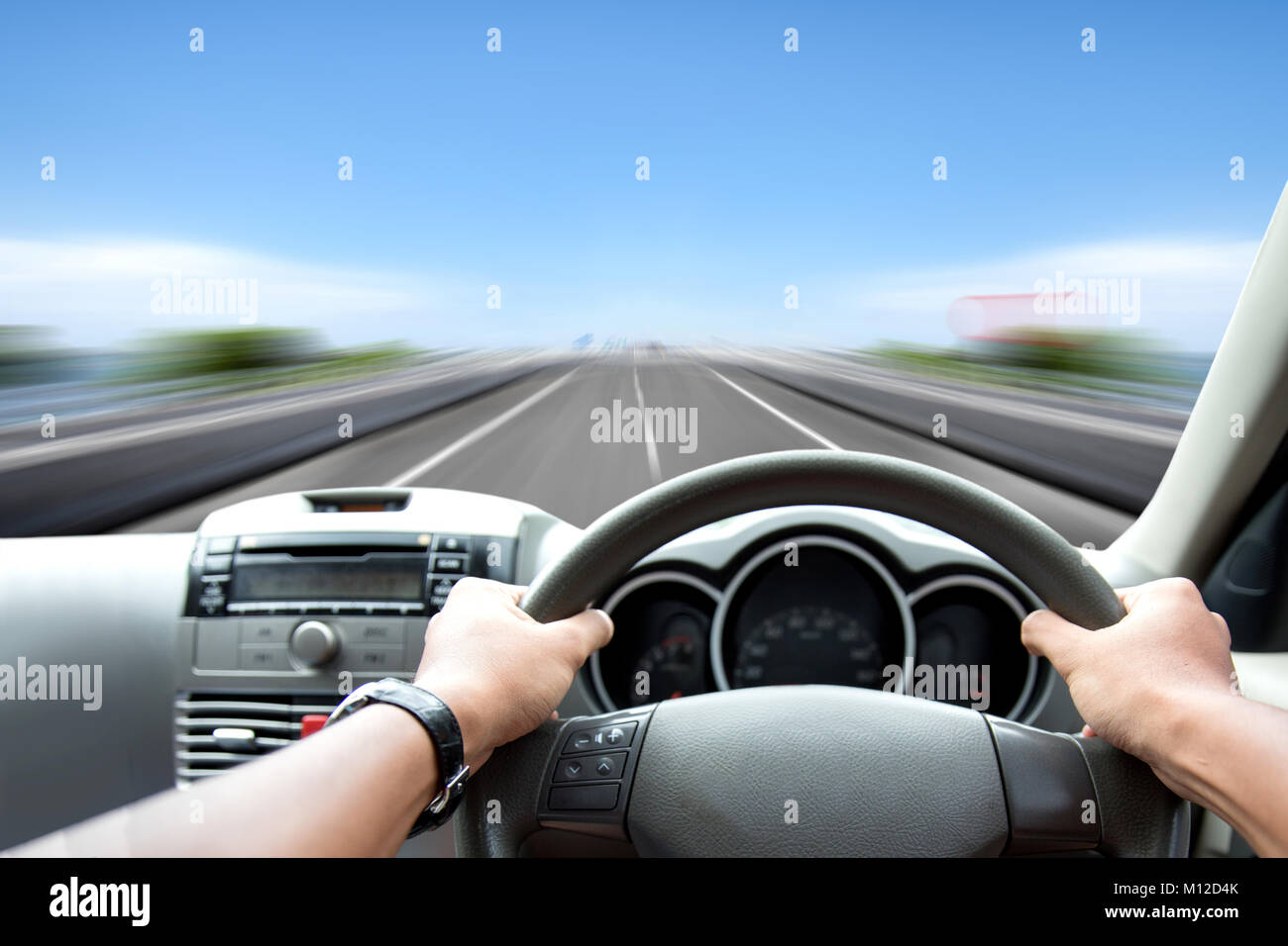 Mans hand holding steering wheel hi-res stock photography and images ...
