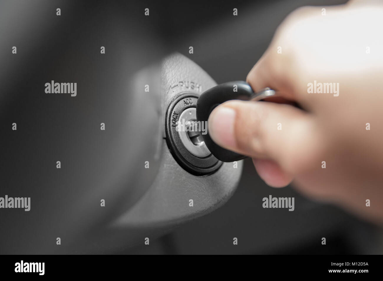 hand's man plug in a key, starting the engine of a car Stock Photo - Alamy