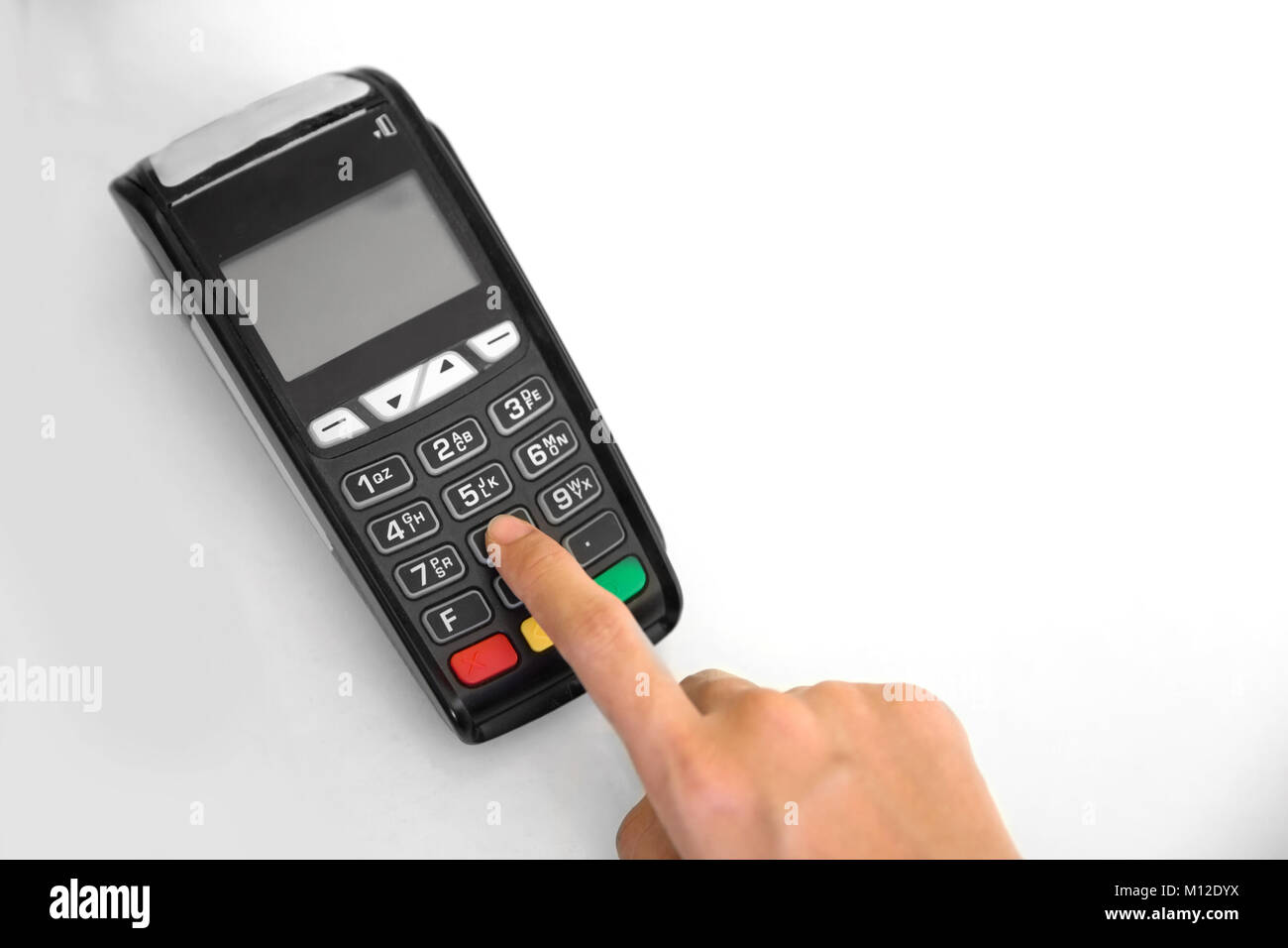 A portrait of EDC ( electronic Data Capture) machine, hand pressing ...