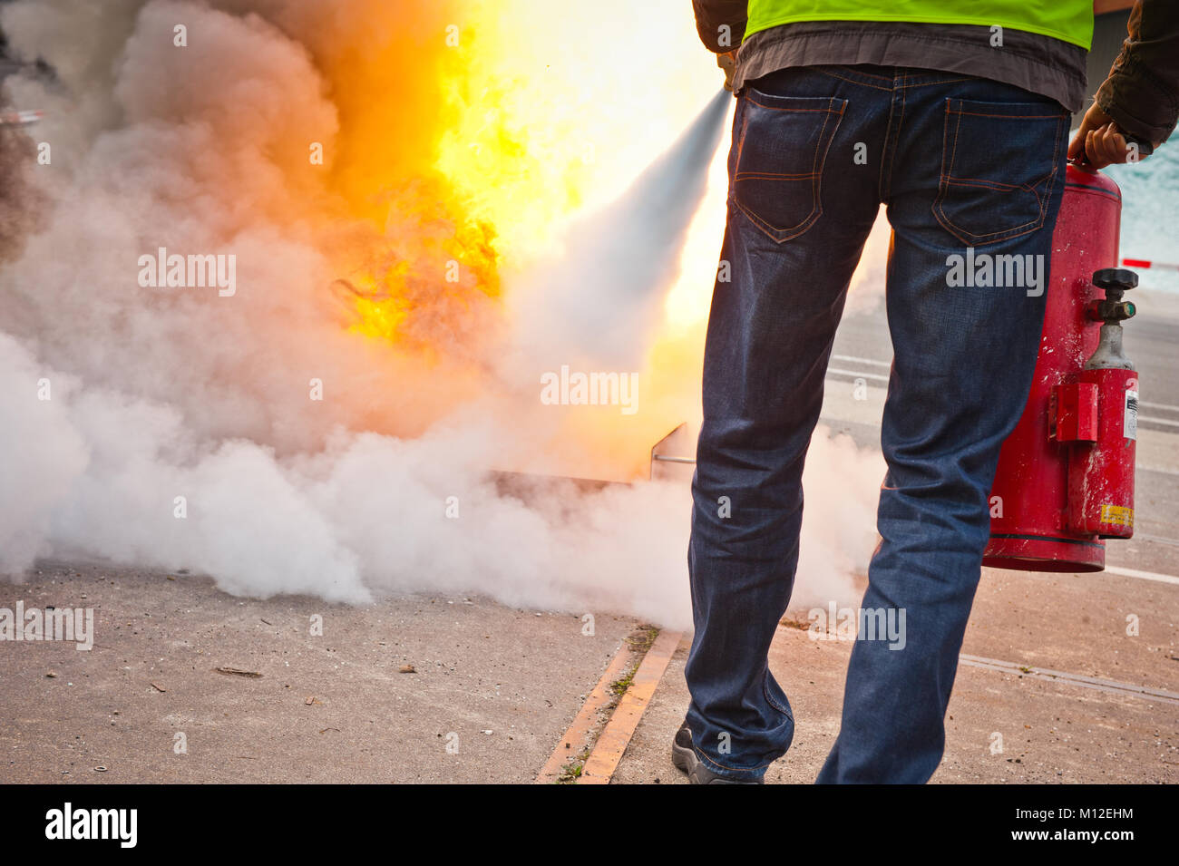 fire extinguisher exercise Stock Photo - Alamy