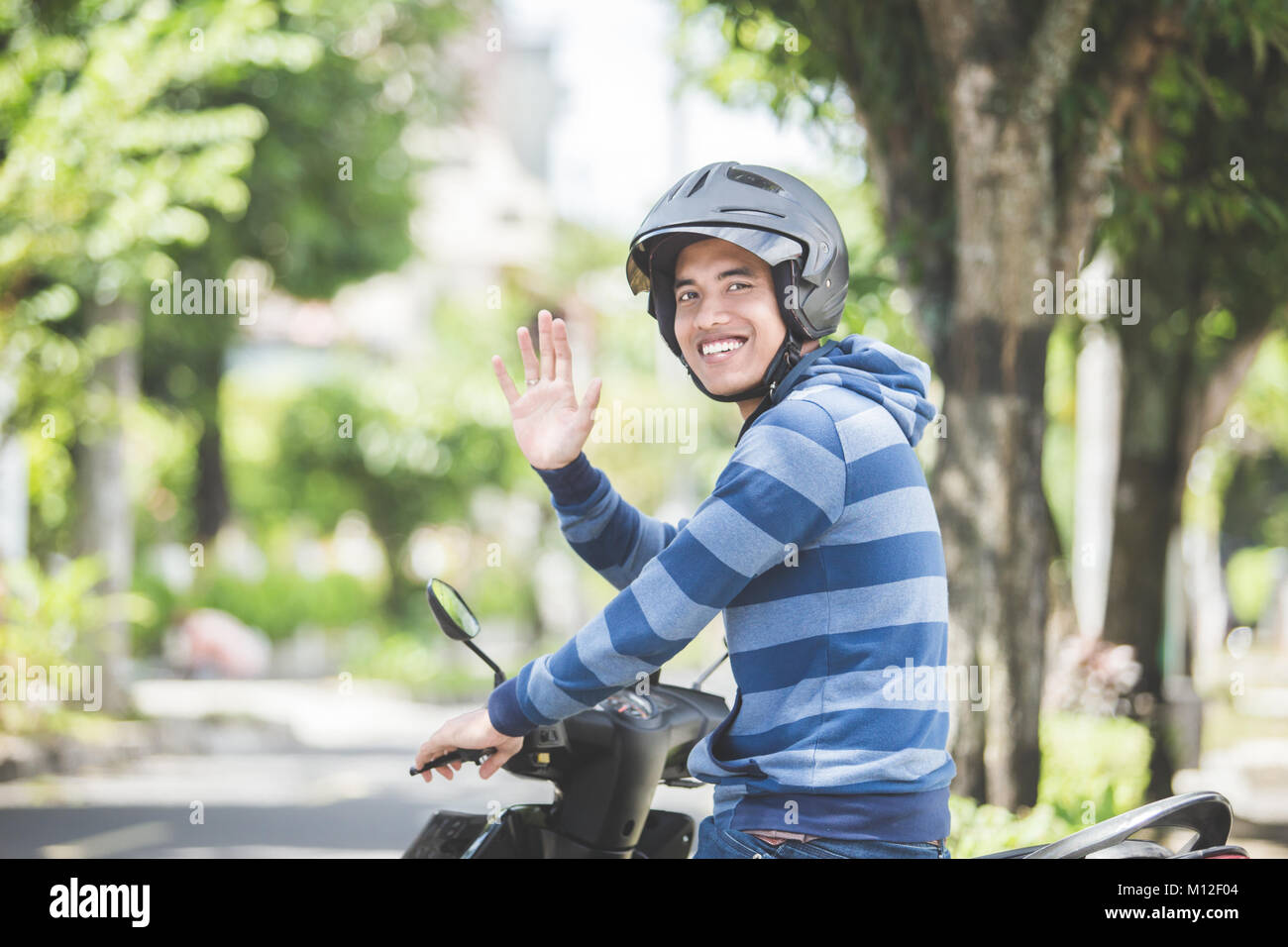 Motorcycle Rider Greeting High Resolution Stock Photography and Images ...