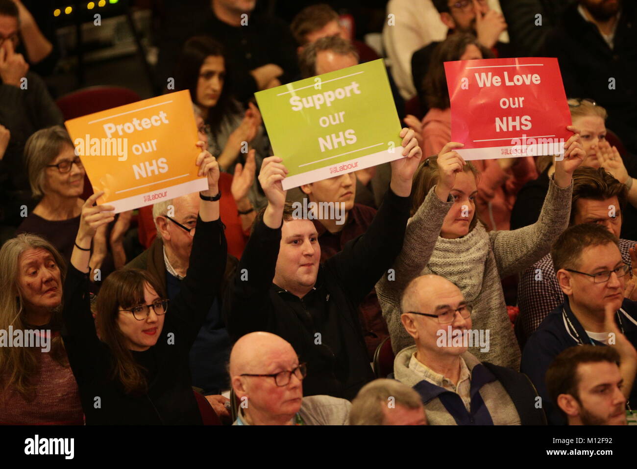 Members of the NHS hold up placards during a rally at Westminster ...