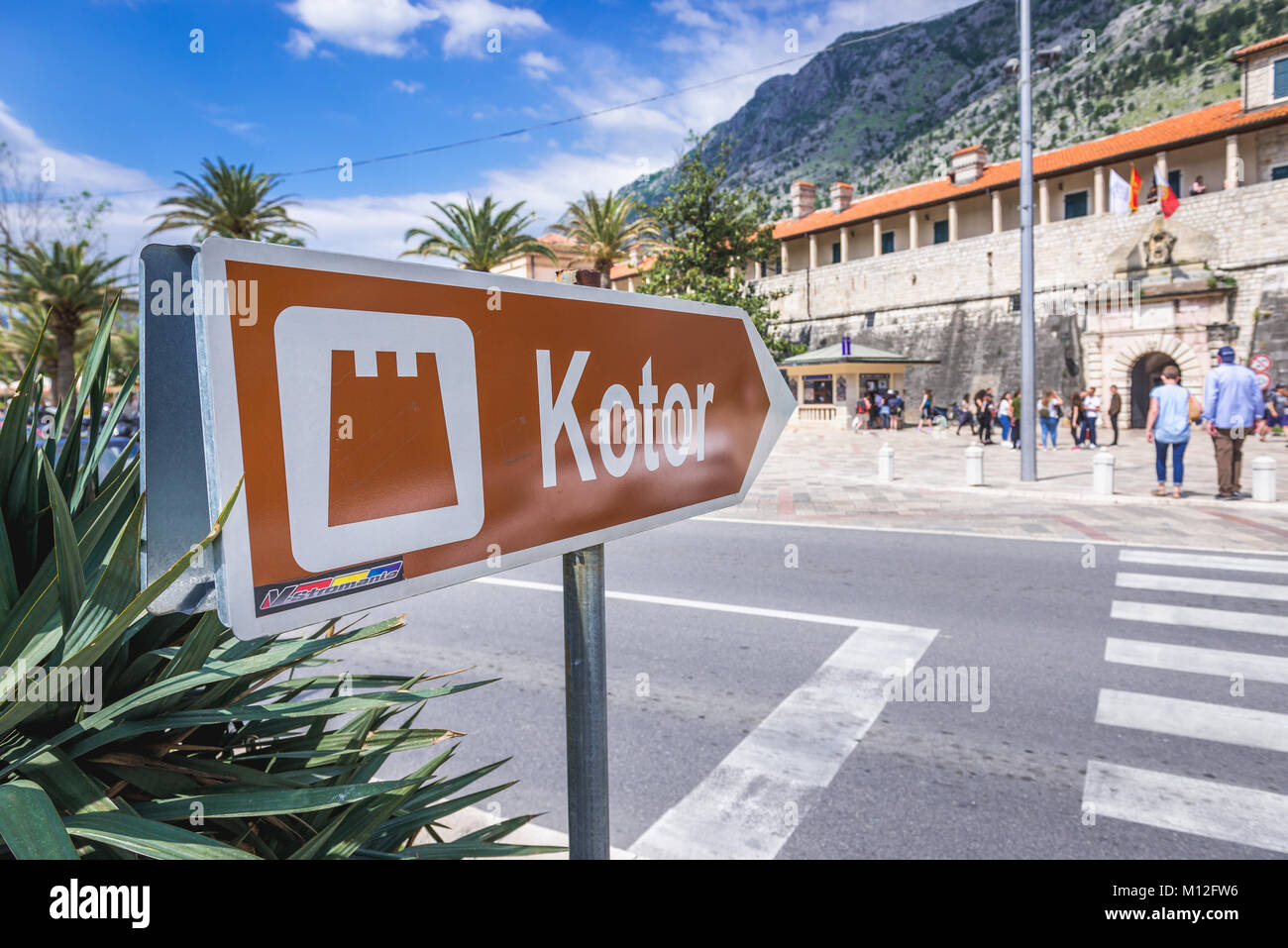 Sign pointing Sea Gate, main entrance to the Old Town of Kotor coastal ...