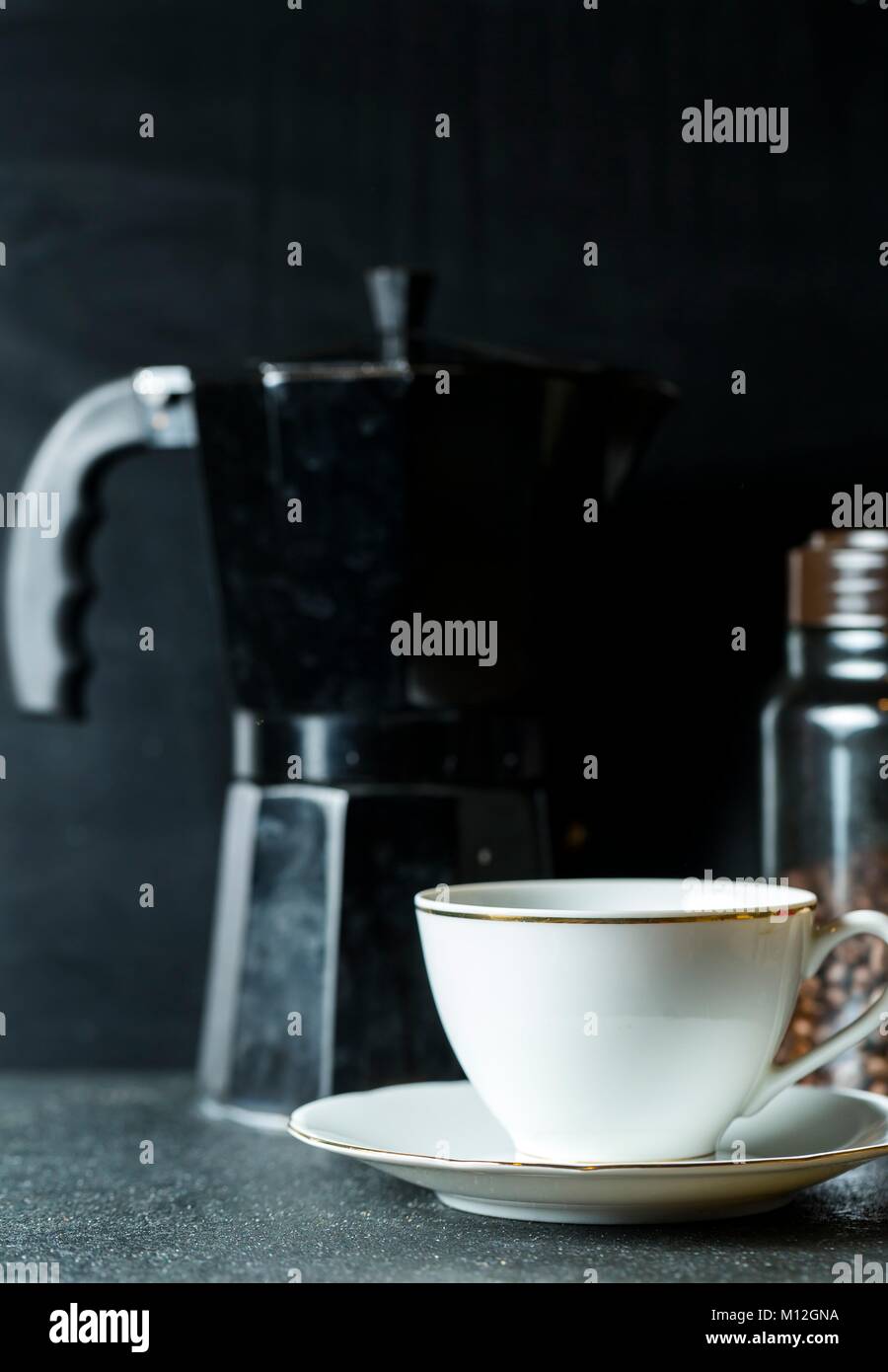 Coffee composition with tools for preparing espresso on dark background ...