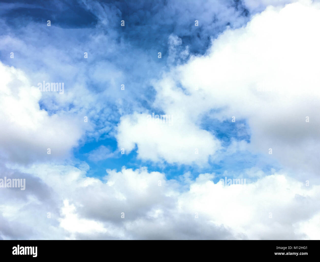 Could and blue sky in rainy season Stock Photo - Alamy