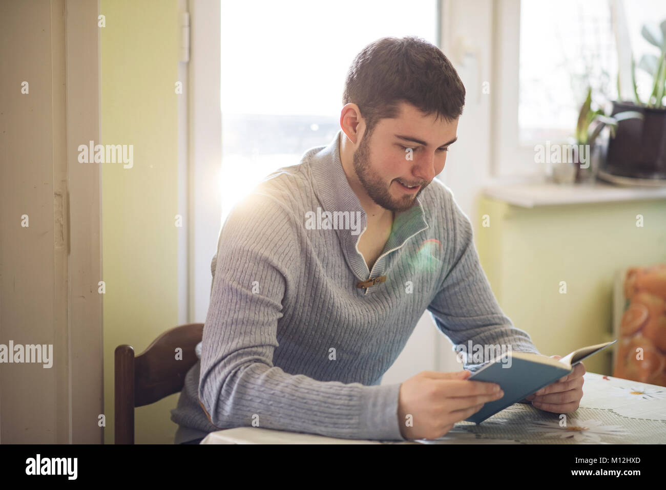 Reading the good book hi-res stock photography and images - Alamy