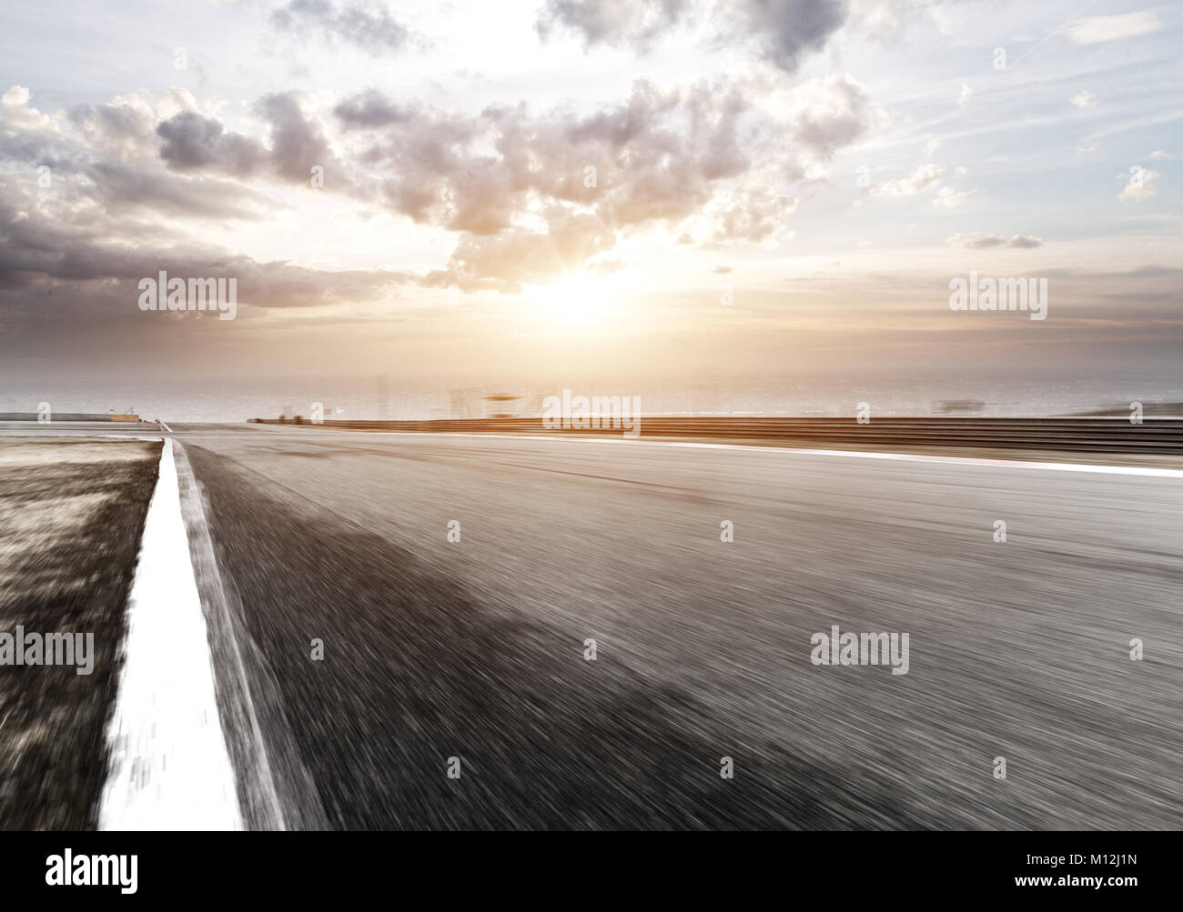 blurry empty car racing track in shaoxing in blue sky Stock Photo - Alamy