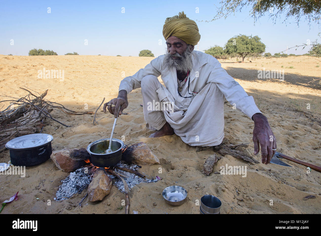 Cooking in the Thar Desert of Jaisalmer, Rajasthan, India Stock Photo ...