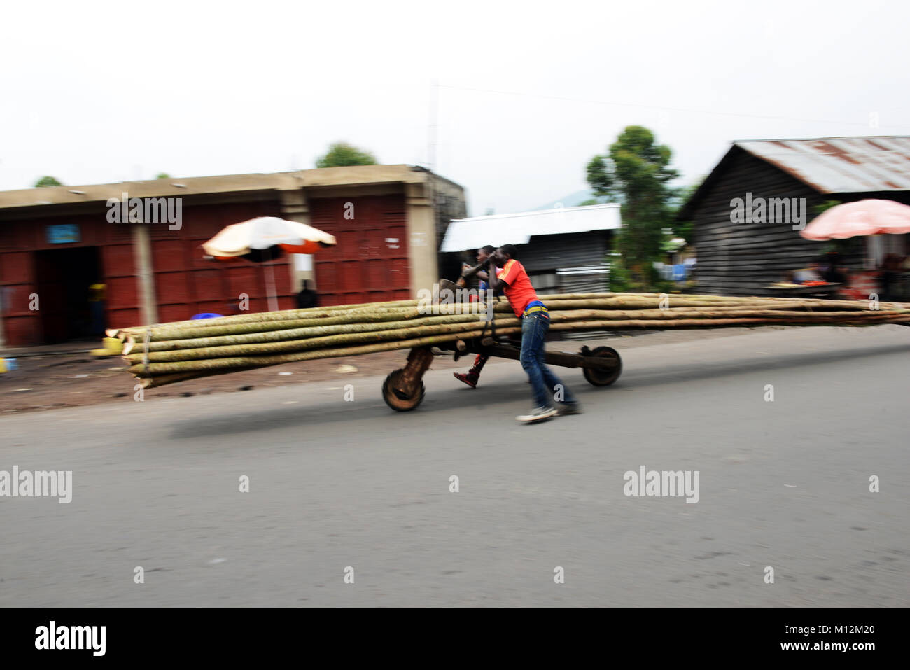 Chukudu is a traditional wooden bike transporting goods in Goma and ...
