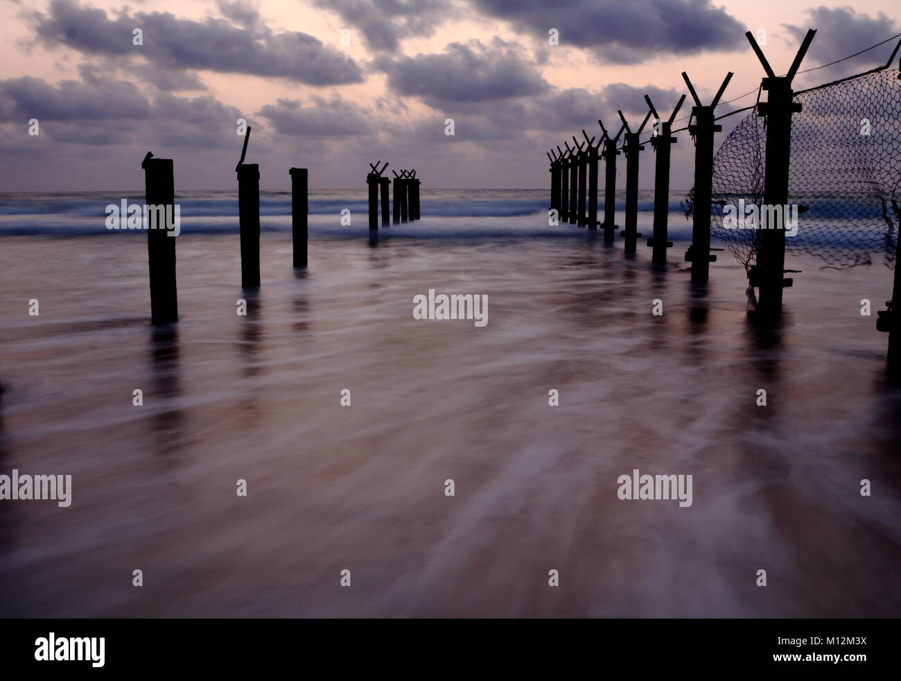 tide stream at sea sunset Stock Photo - Alamy