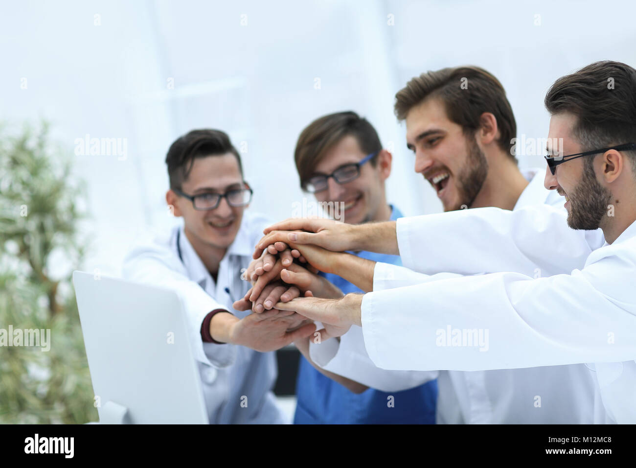medical team showing their success Stock Photo - Alamy