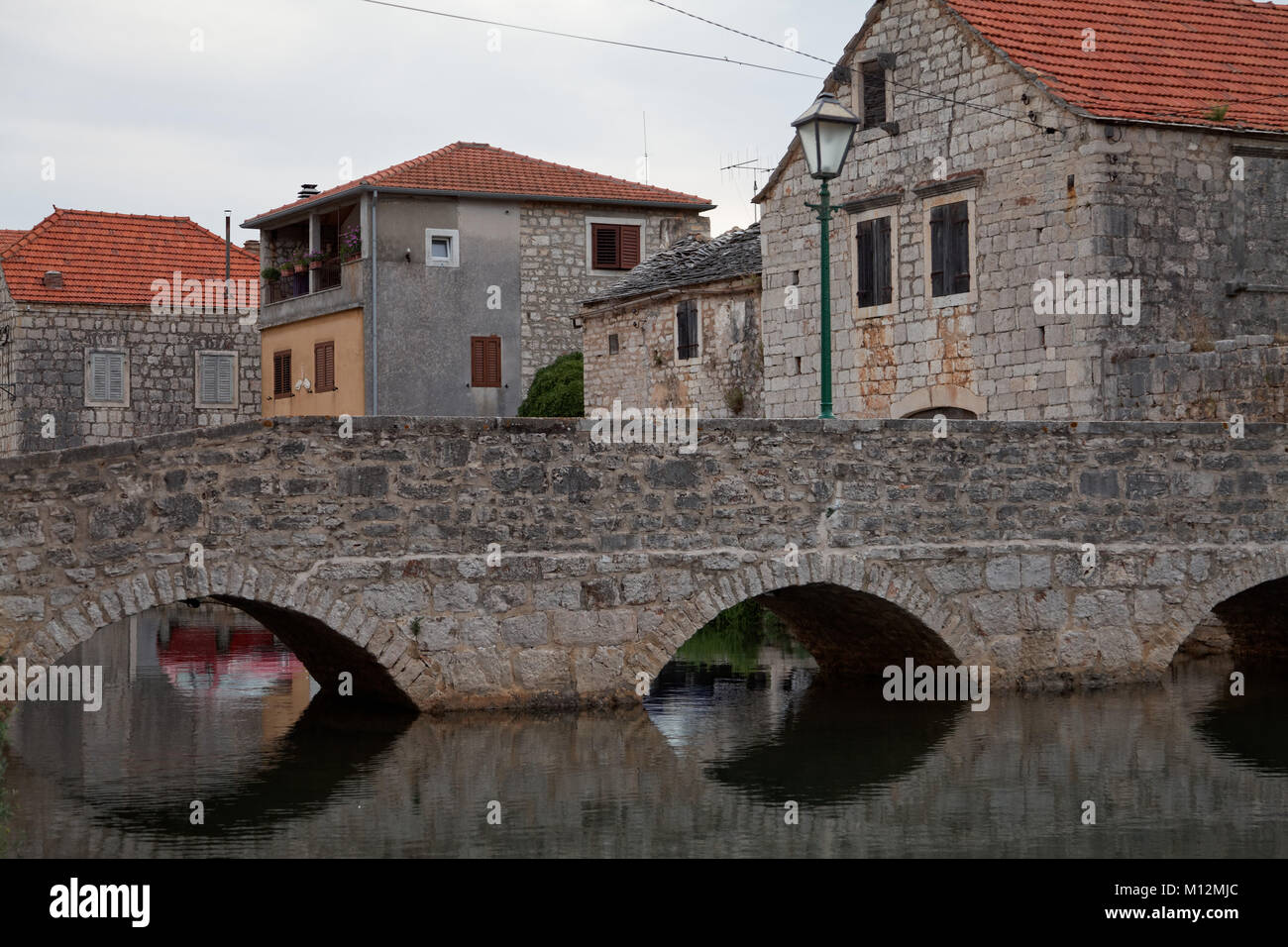 Old stone bridge in Vrboska on Hvar Island, Croatia Stock Photo - Alamy