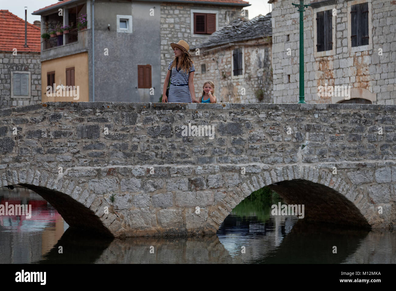 Old stone bridge in Vrboska on Hvar Island, Croatia Stock Photo - Alamy